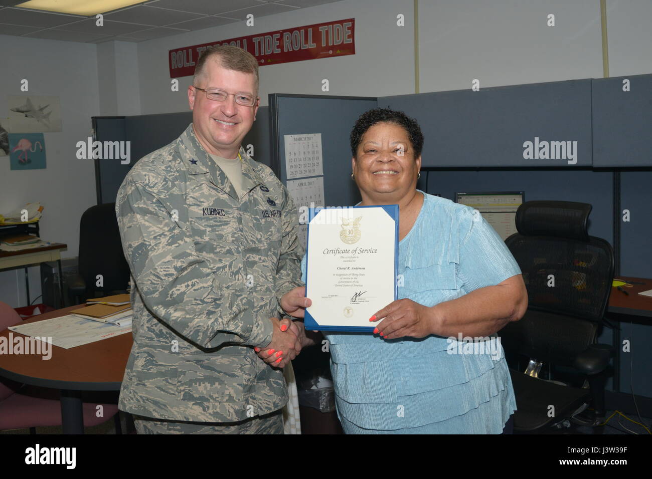 First quarter awards and 30-year service pins are presented to military ...