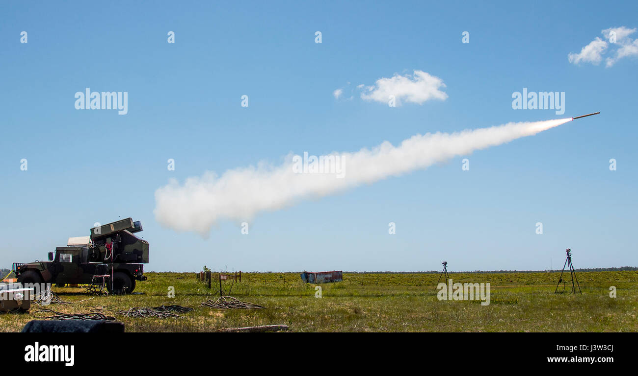 An FIM-92 Stinger missile is fired downrange from an Army Avenger ...