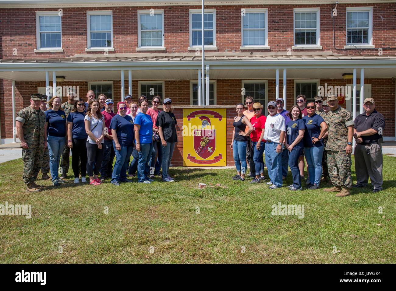 U.S. Marines with II Marine Expeditionary Force (II MEF) pose for a ...