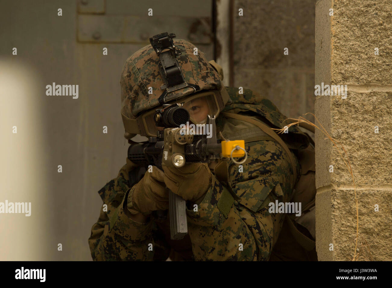 A Marine provides security during a military operations on urbanized ...