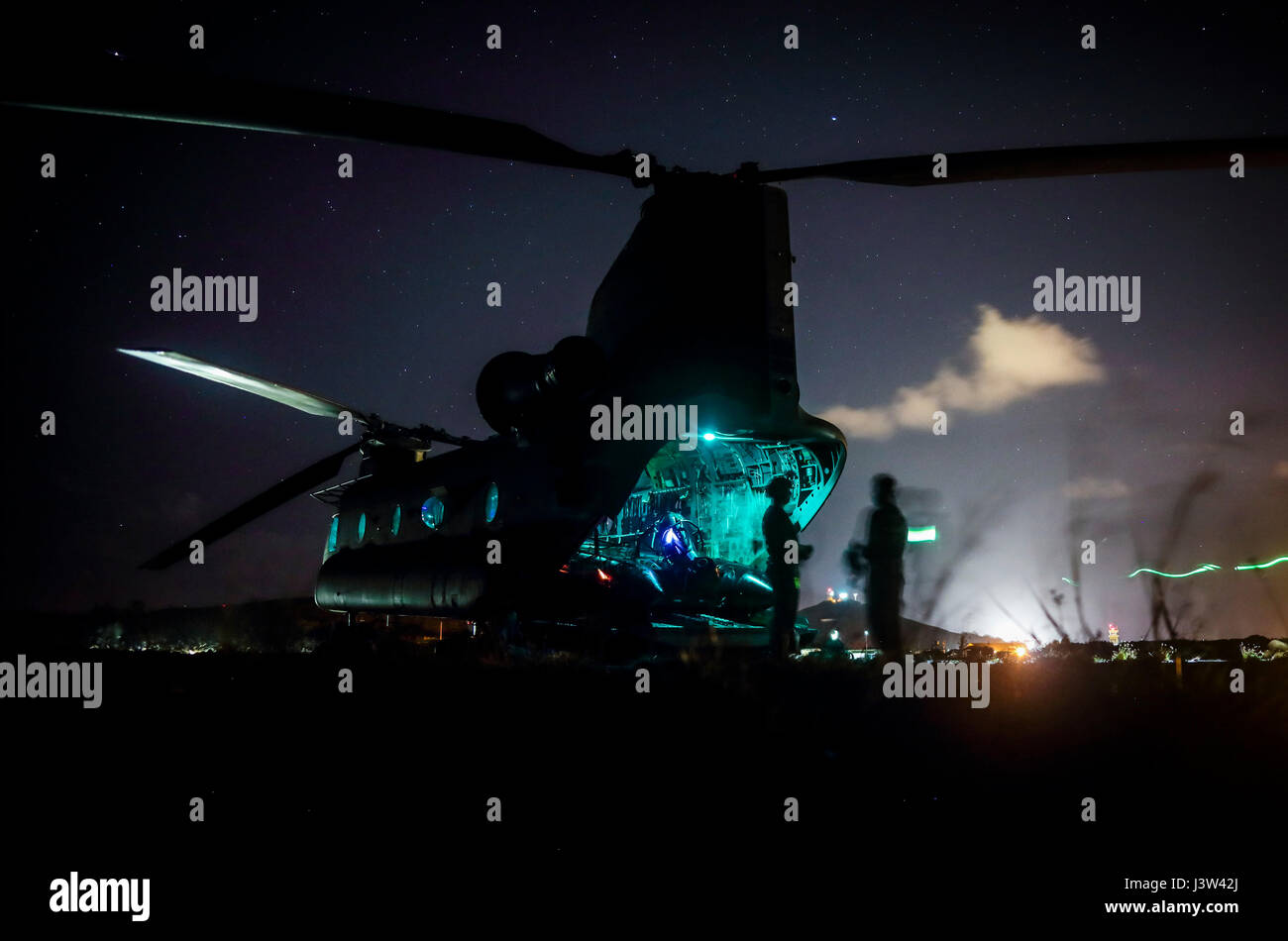 U.S. Reconnaissance Marines, prepare to conduct night time helo-casting ...