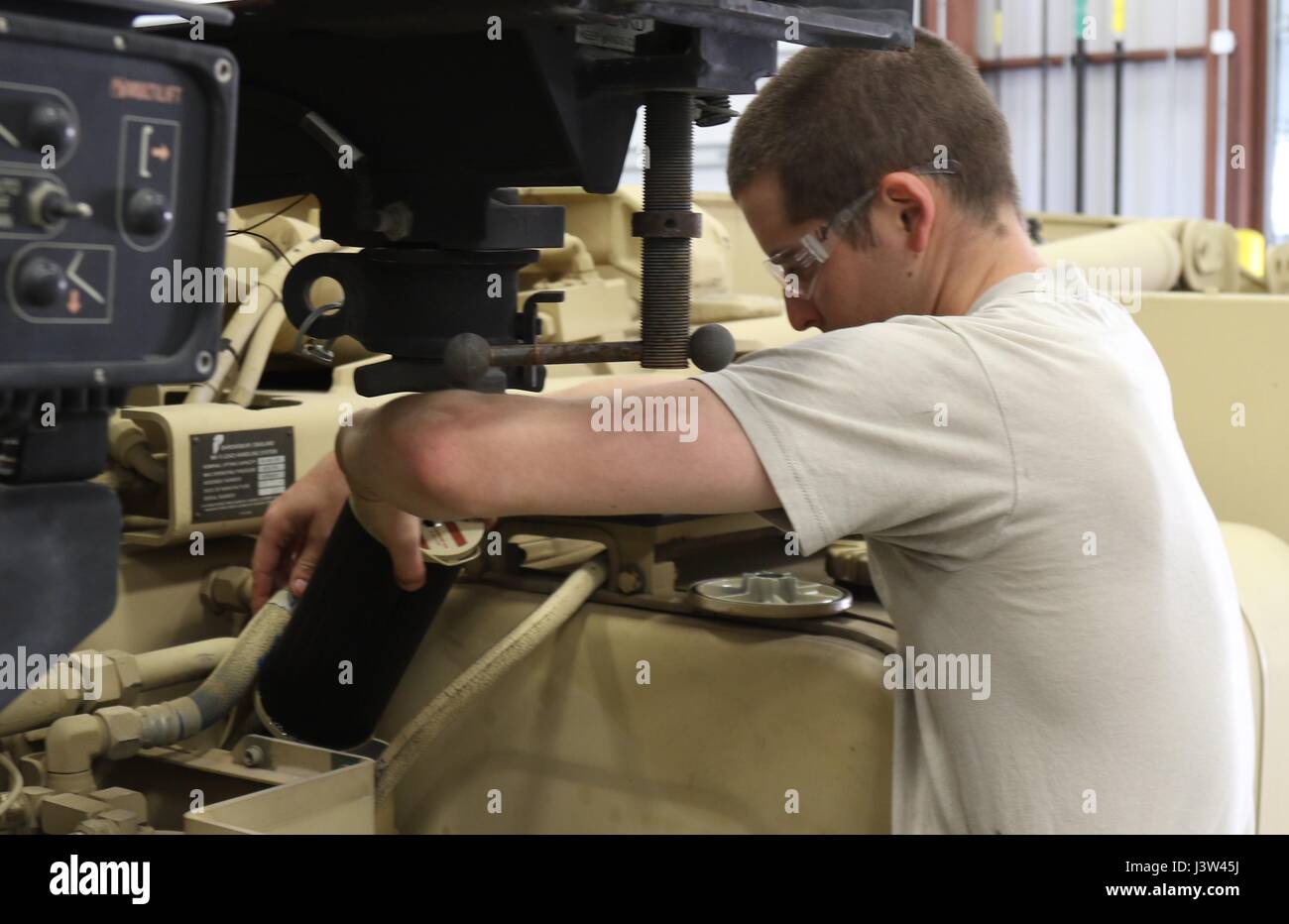 U.S Army Reserve Spc. Chris Pierce, a wheeled vehicle mechanic with the ...