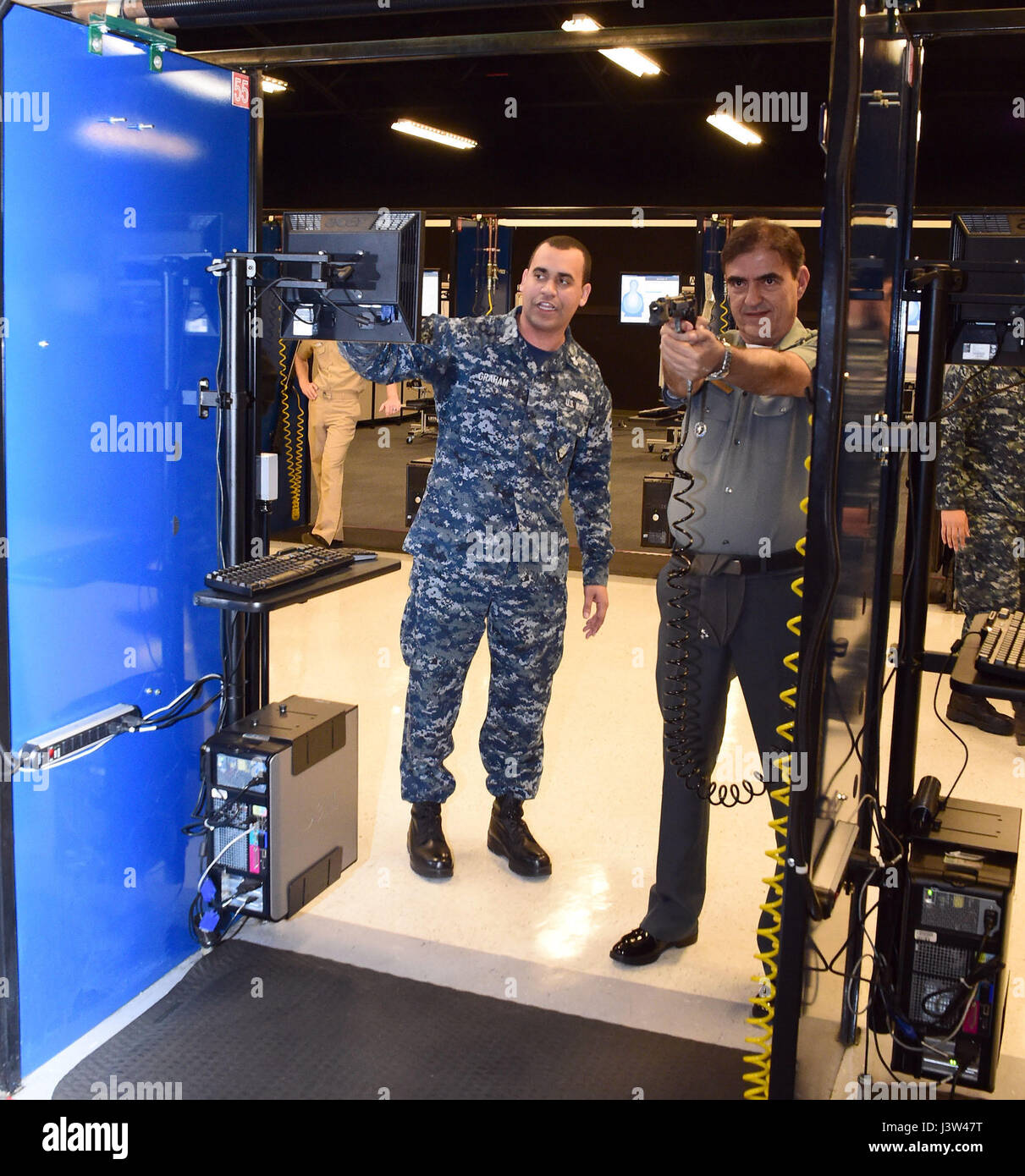 A Brazilian Navy officer participated in an M9 Beretta pistol shoot at ...
