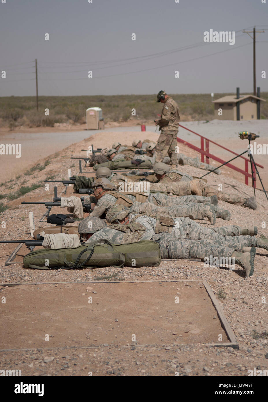 Staff Sgt. Joshua Allen provides environmental readings and guidance to ...