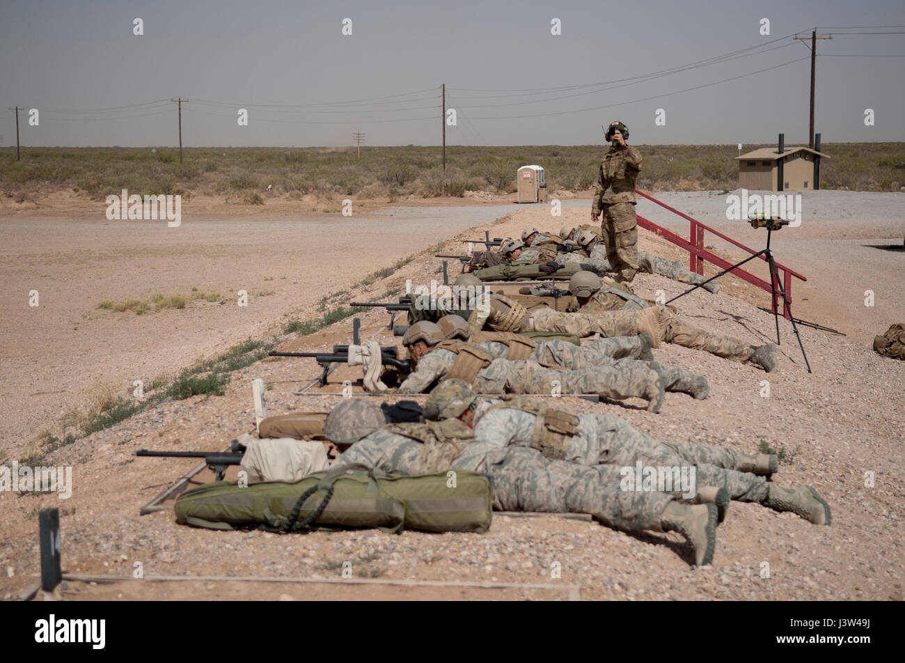 Staff Sgt. Joshua Allen provides environmental readings and guidance to ...
