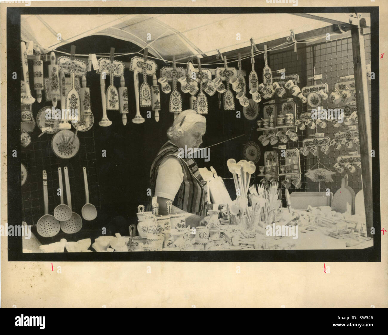 Zech Republic - Miscellaneous - Woman in market of utensils Stock Photo ...