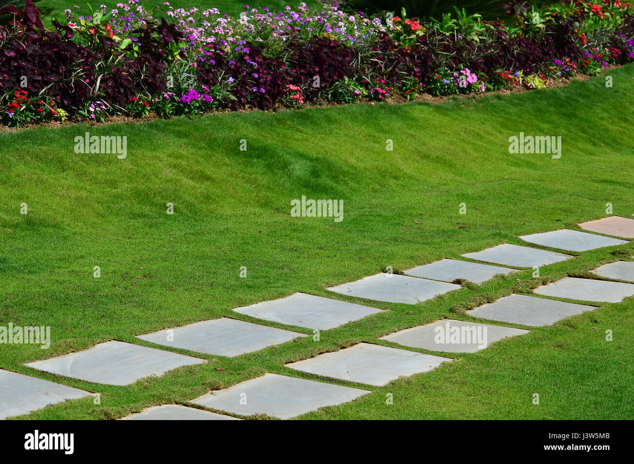 square stone pathway in garden Stock Photo - Alamy