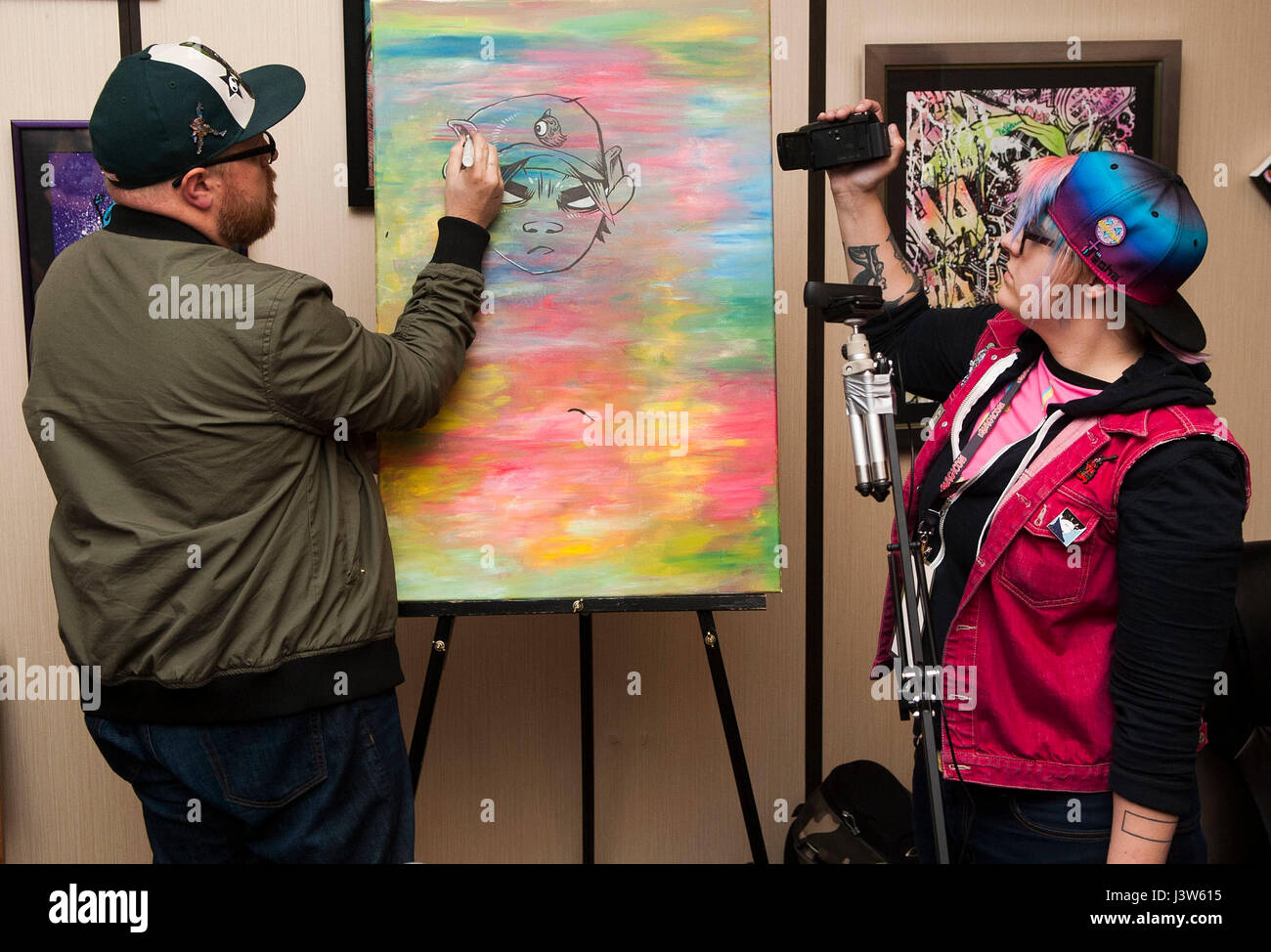 (From left) Nick and Lindsay Difabbio host a livestream painting event ...