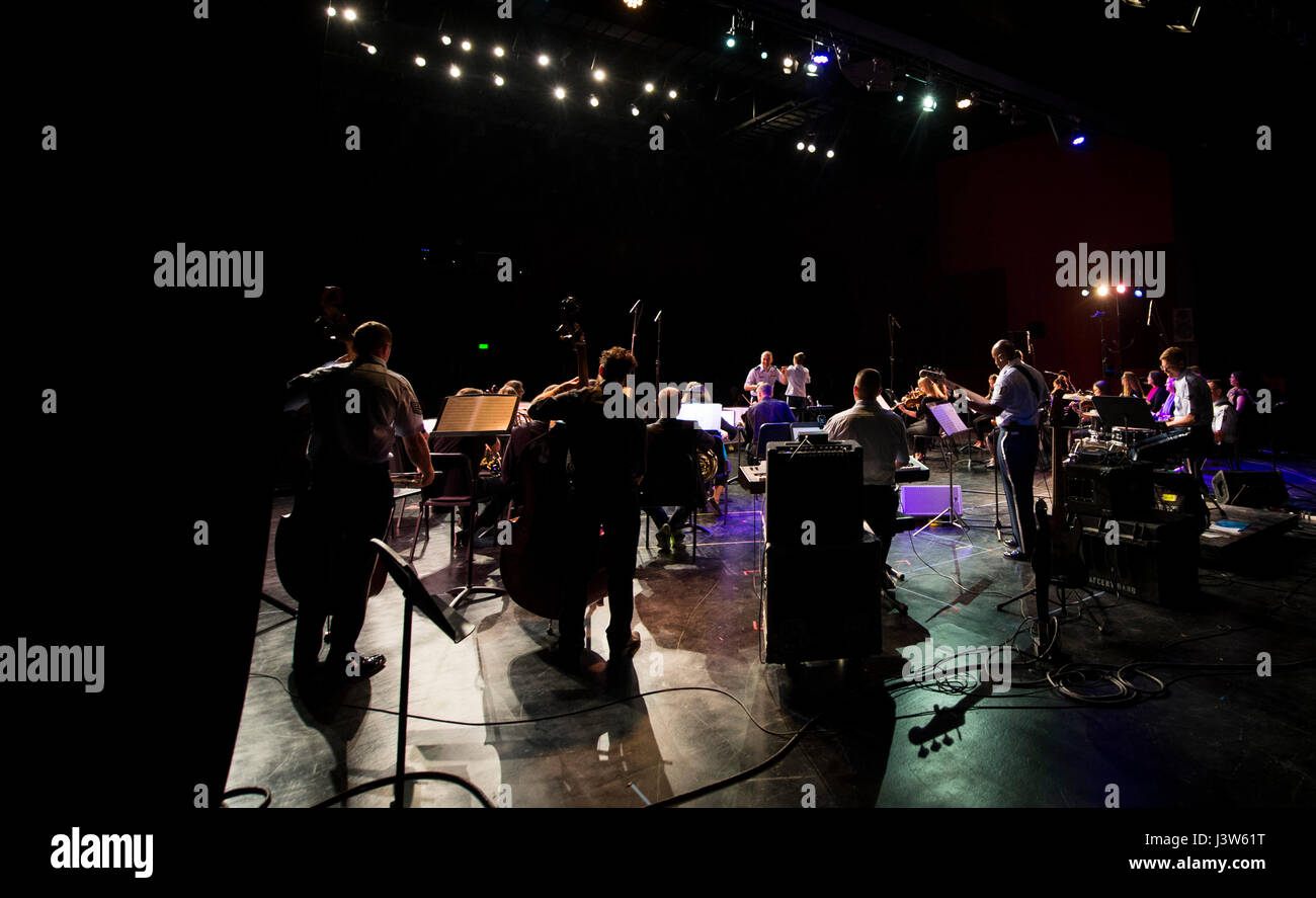 U.S. Air Forces Central Command Band members conduct a joint concert ...