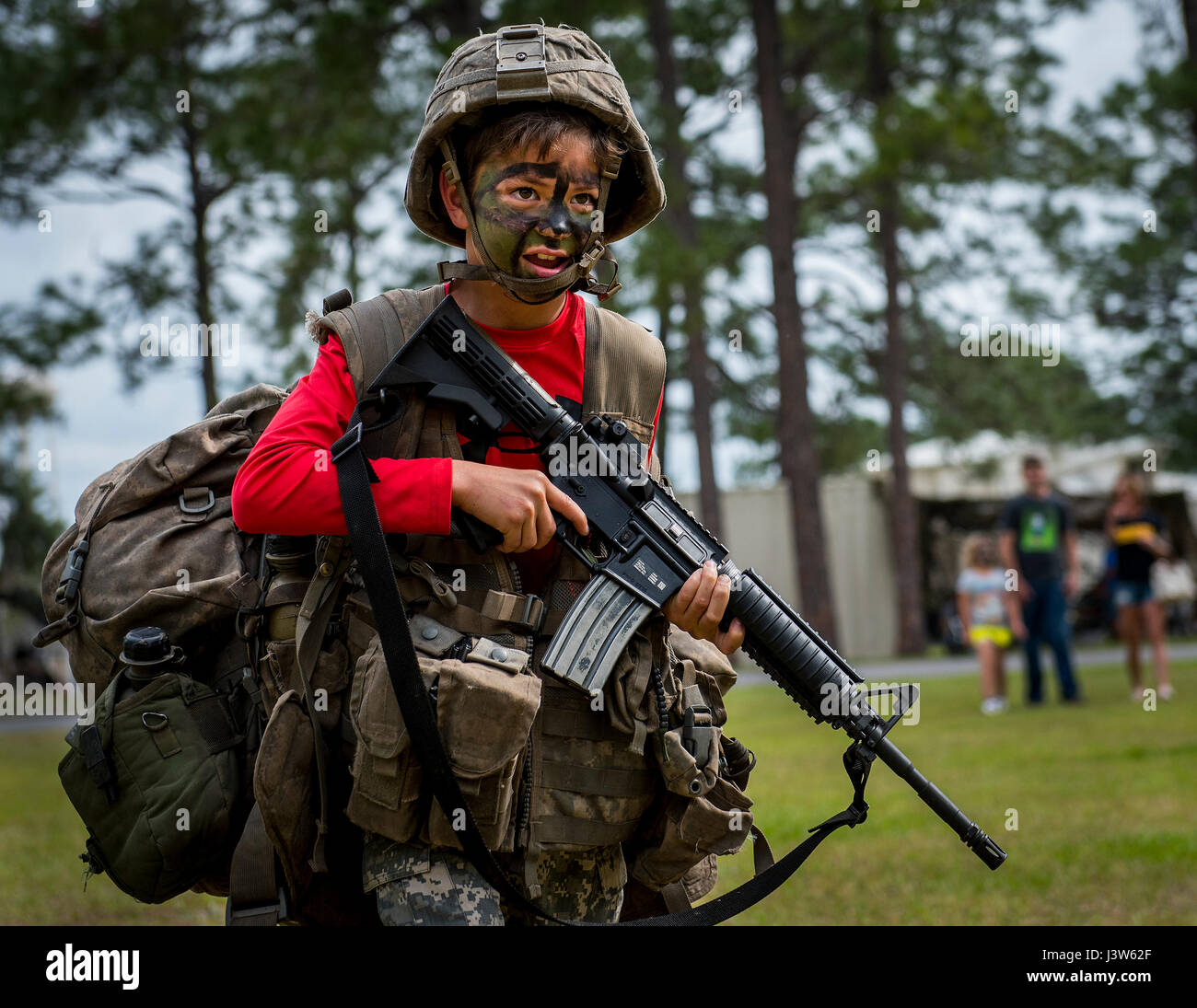 A future Soldier struggles to carry all the equipment and gear required ...
