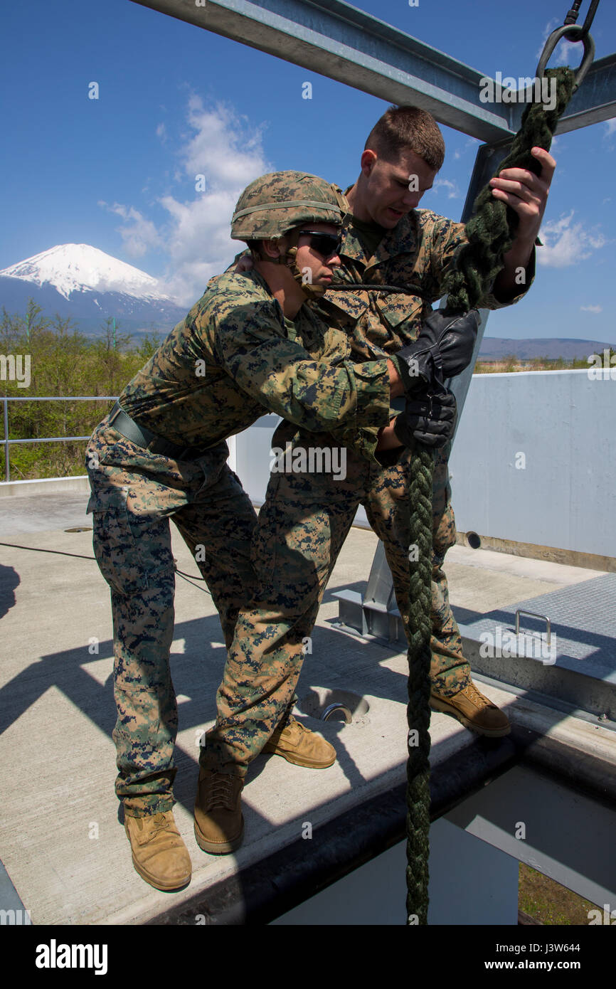 U.S. Marines from 3rd Battalion, 8th Marines conduct fast rope ...