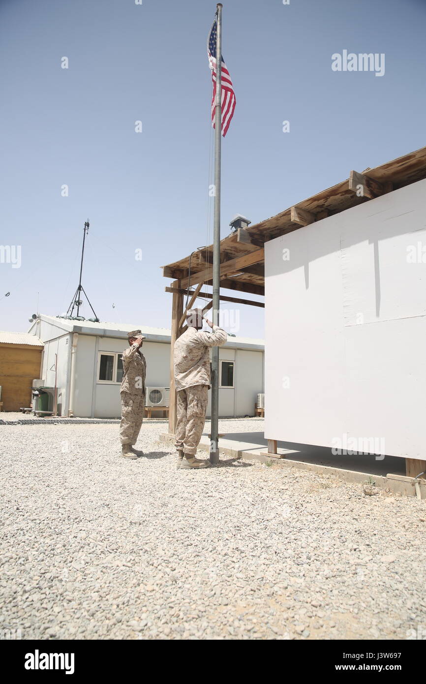 U.S. Marines with Task Force Southwest raise the American flag during a ...