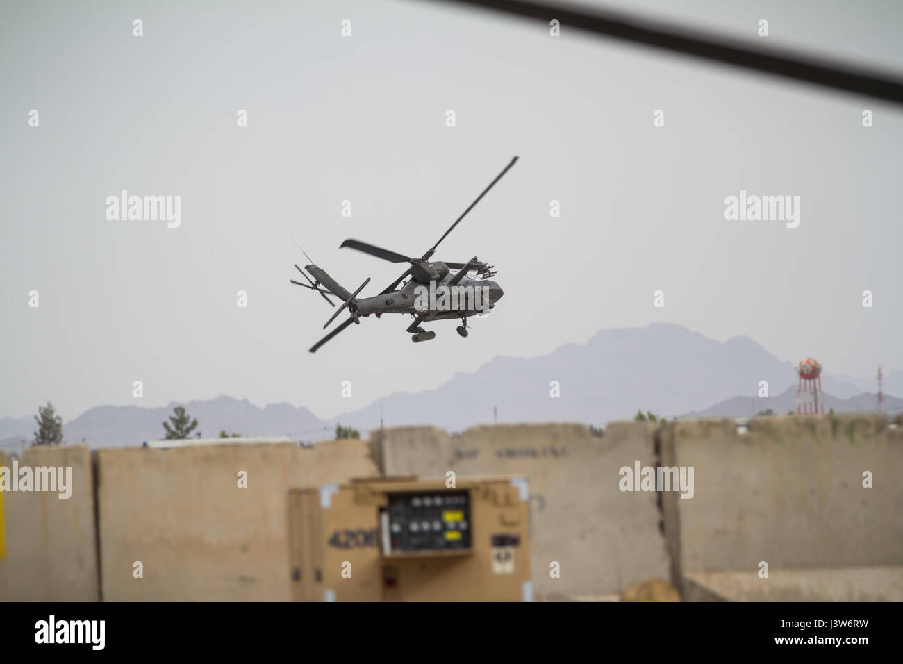 U.S. Army AH-64 Apache helicopter pilots assigned to Task Force Warhawk ...