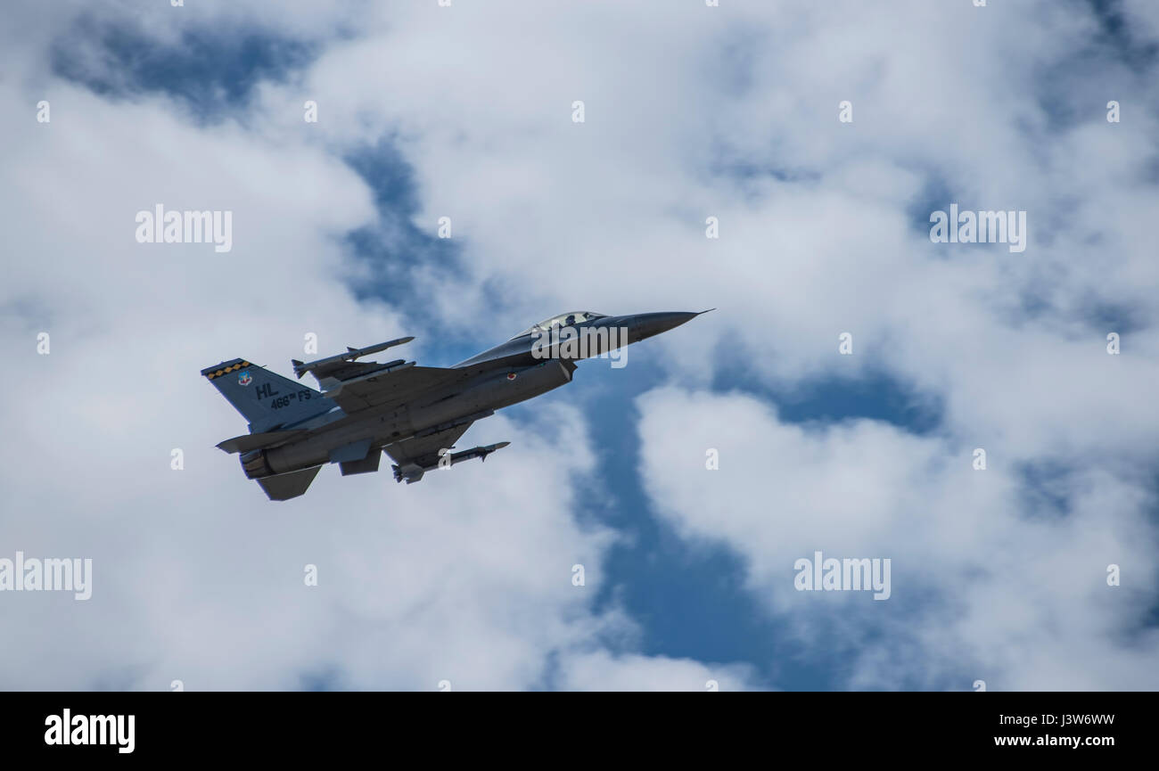 An F-16 Fighting Falcon from Hill Air Force Base, Utah, soars through ...
