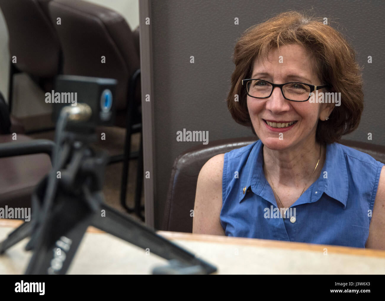 Arlene Wagner, Gold Star mother, smiles for a Gold Star Base Access ID ...