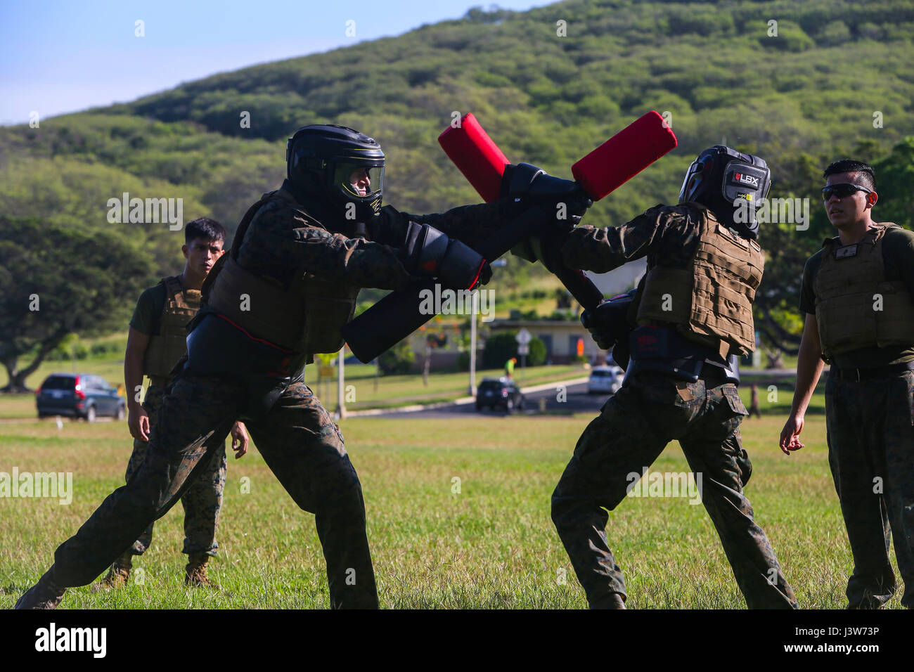 MARINE CORPS BASE HAWAII – Marines attached to the 11th Marine Expeditionary Unit fight during ...
