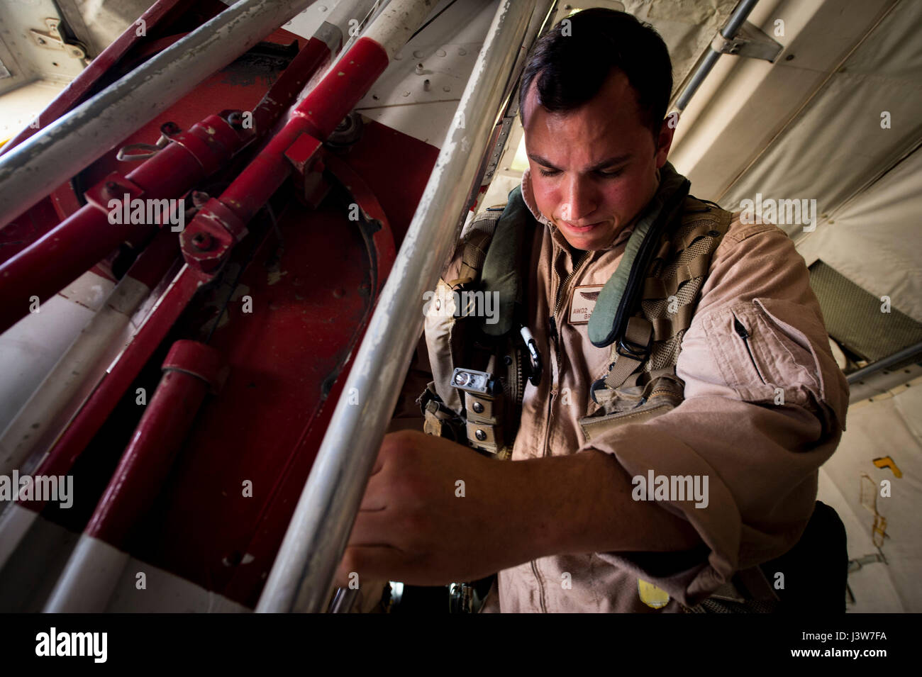 U.S. Naval Aircrewman (Operator) 3rd Class Joey Maringo, assigned to ...