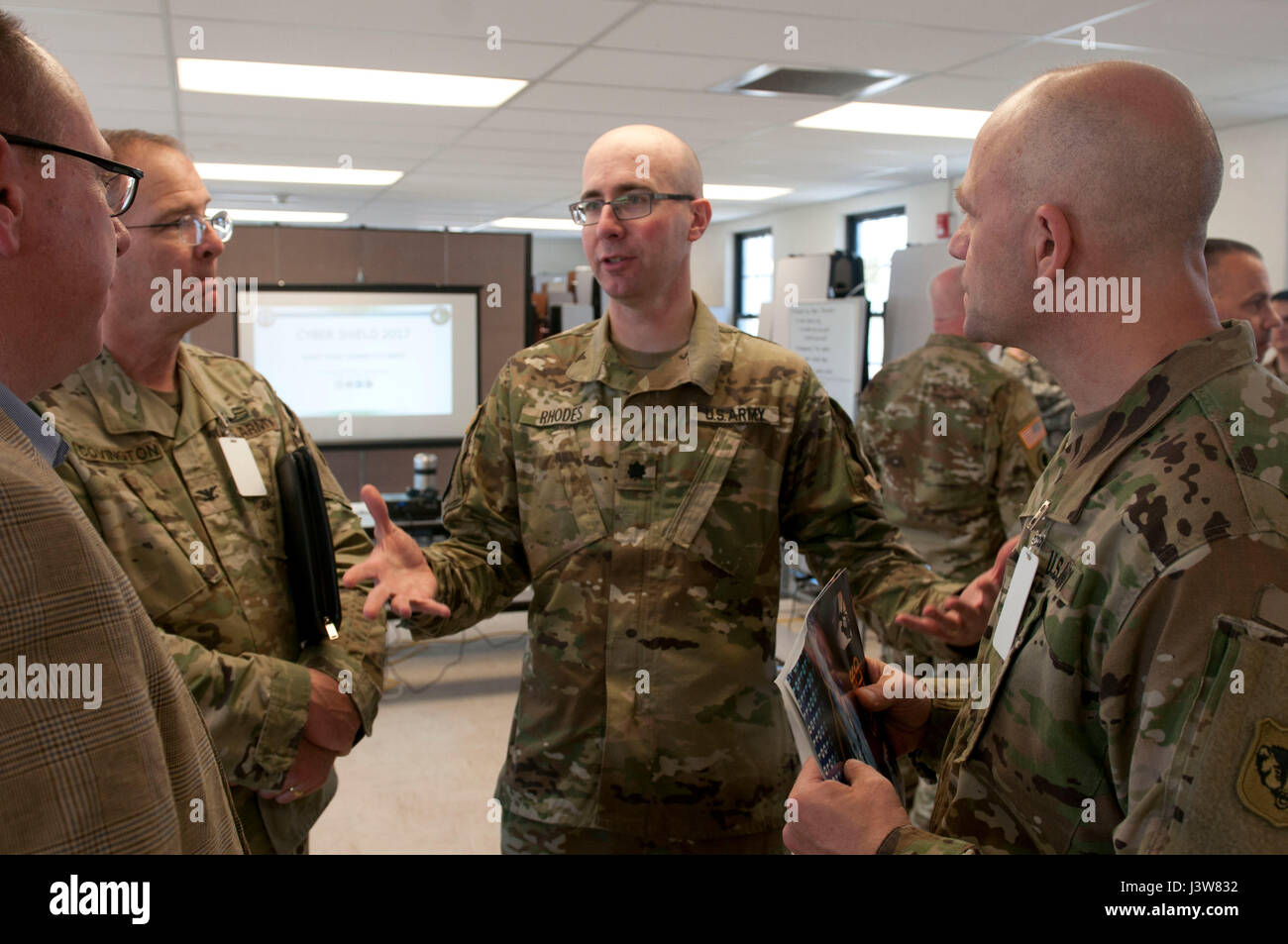 Lt. Col. Brad Rhodes, commander of Cyber Protection Team 174, with the ...