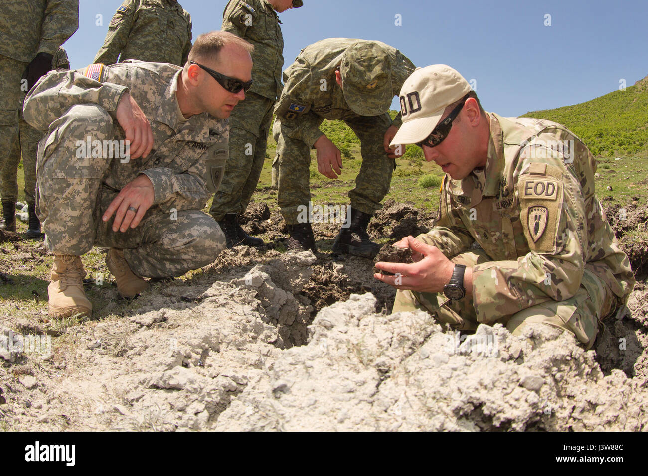 U.S. Army Staff Sgt. Brian Miller, an explosive ordnance disposal team ...