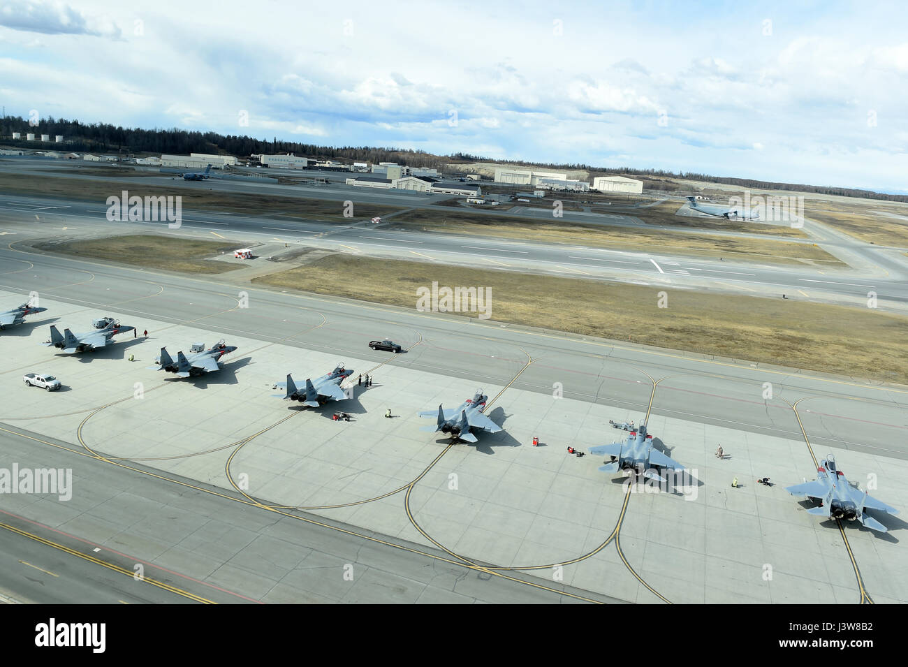 Various aircraft line the flightline at Joint Base Elmendorf-Richardson ...