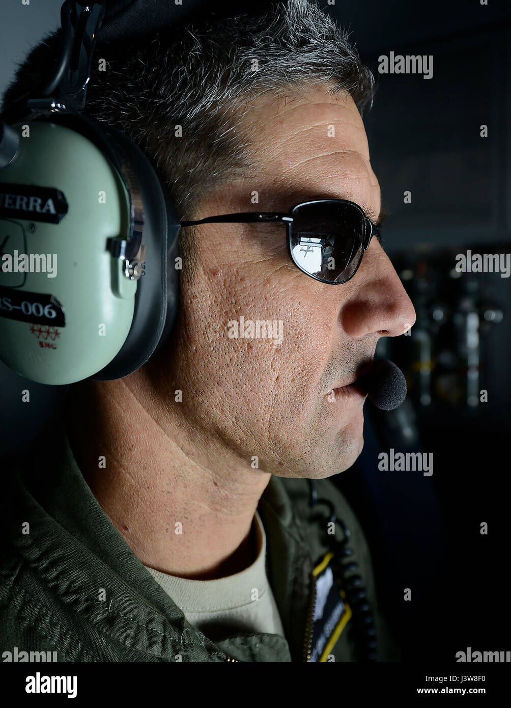 A KC-10 Extender boom operator conducts in-flight refueling for ...