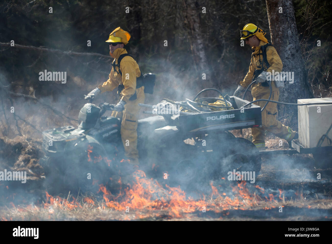 Firefighting personnel, assigned to the 673d Civil Engineer Squadron ...