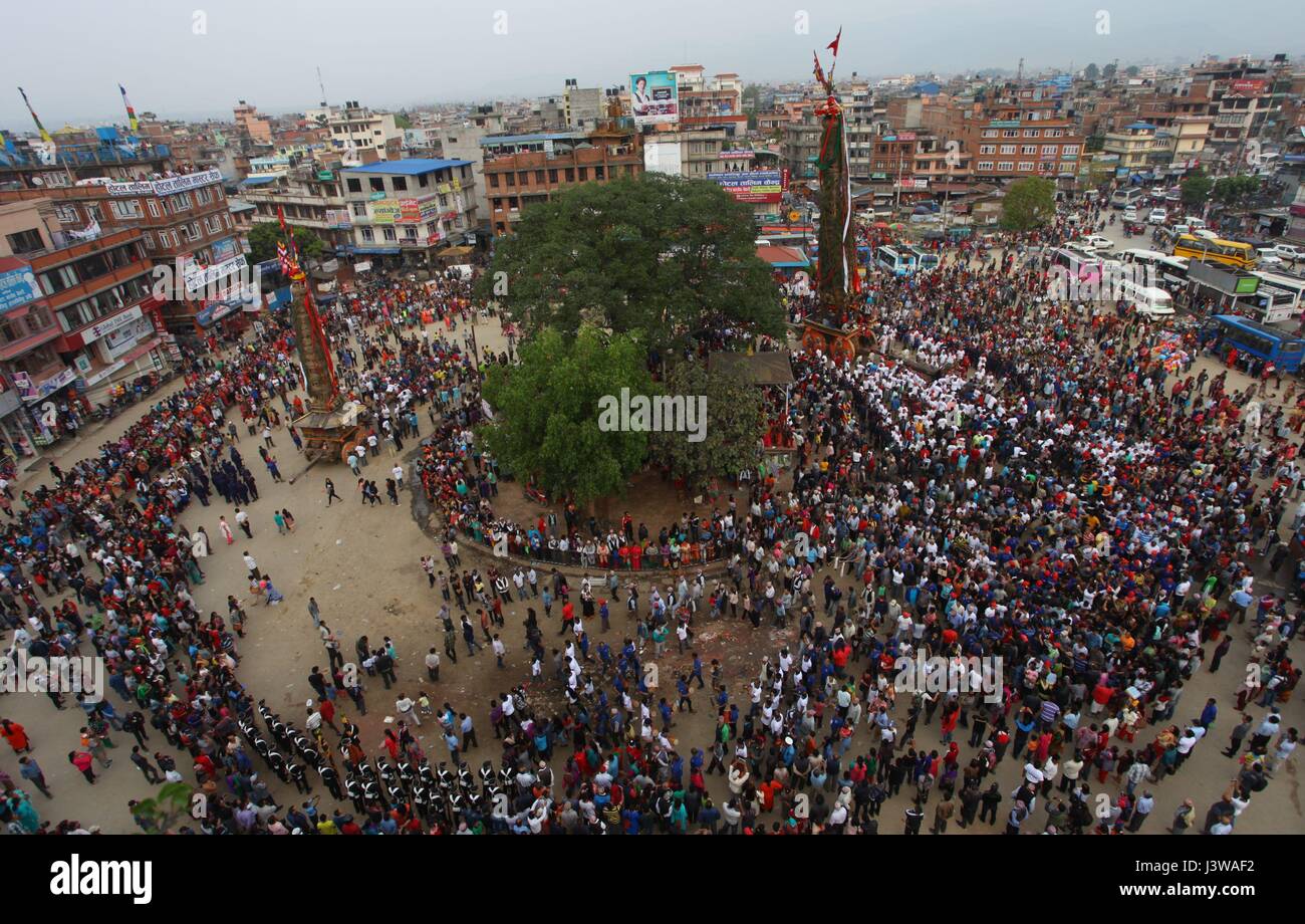 People participate in the chariot procession of Rato Machhendranath ...