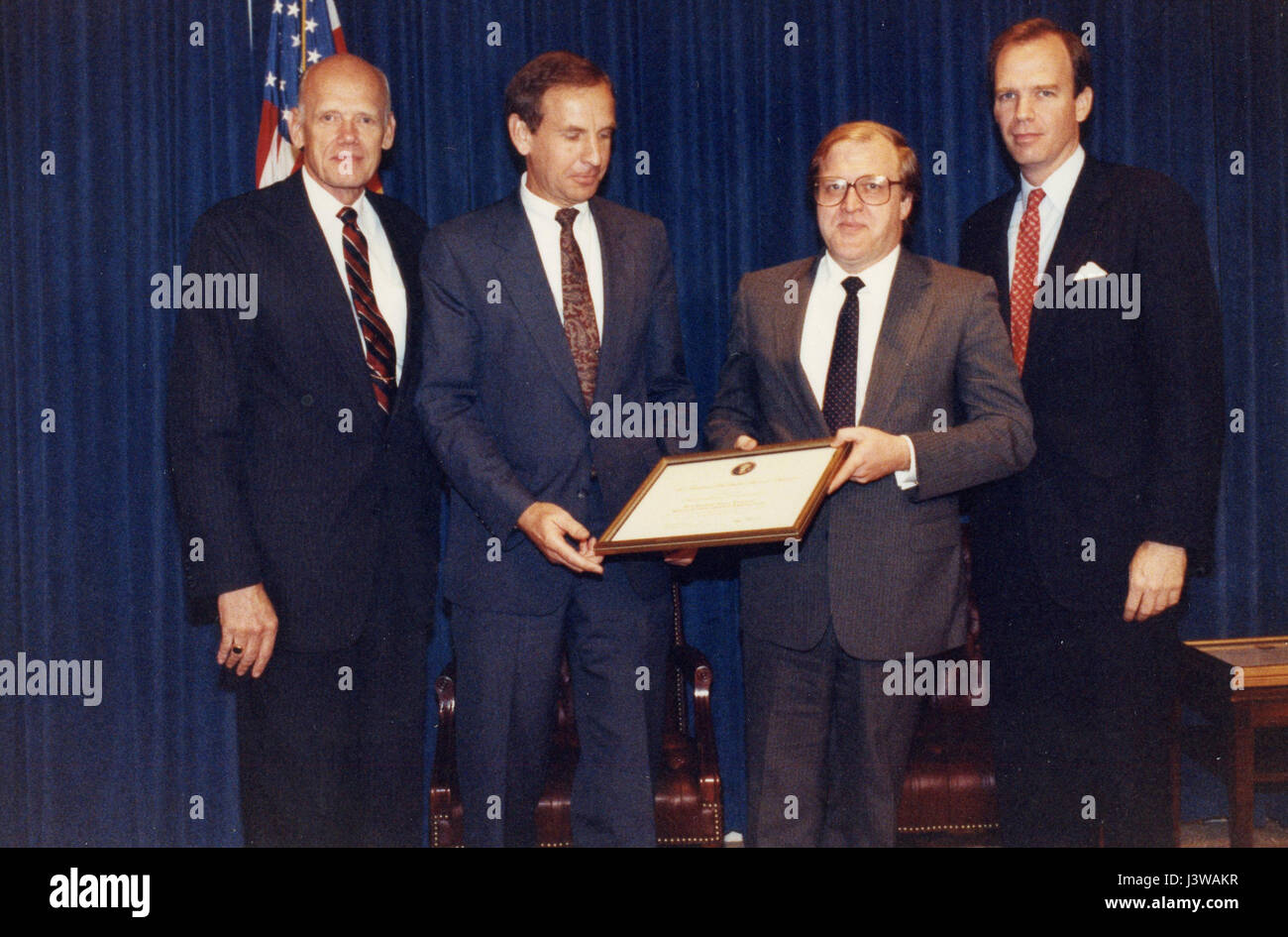 Administrators pose with award recipients during the 1990 Roskens-End ...