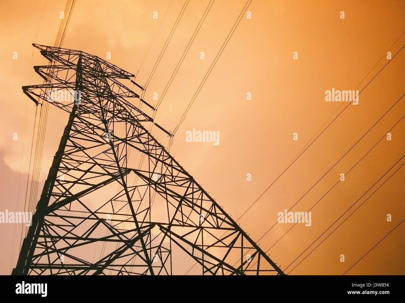 Electricity Pylon with connecting power cable at evening Stock Photo ...