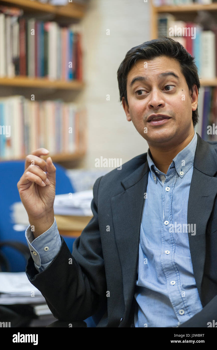 Rana Mitter surrounded by books at Oxford University Stock Photo - Alamy