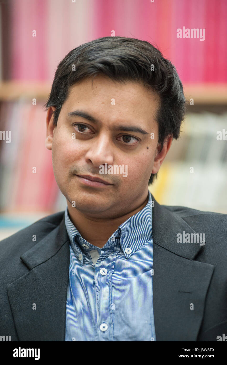 Rana Mitter surrounded by books at Oxford University Stock Photo - Alamy