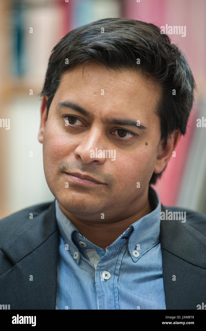 Rana Mitter surrounded by books at Oxford University Stock Photo - Alamy