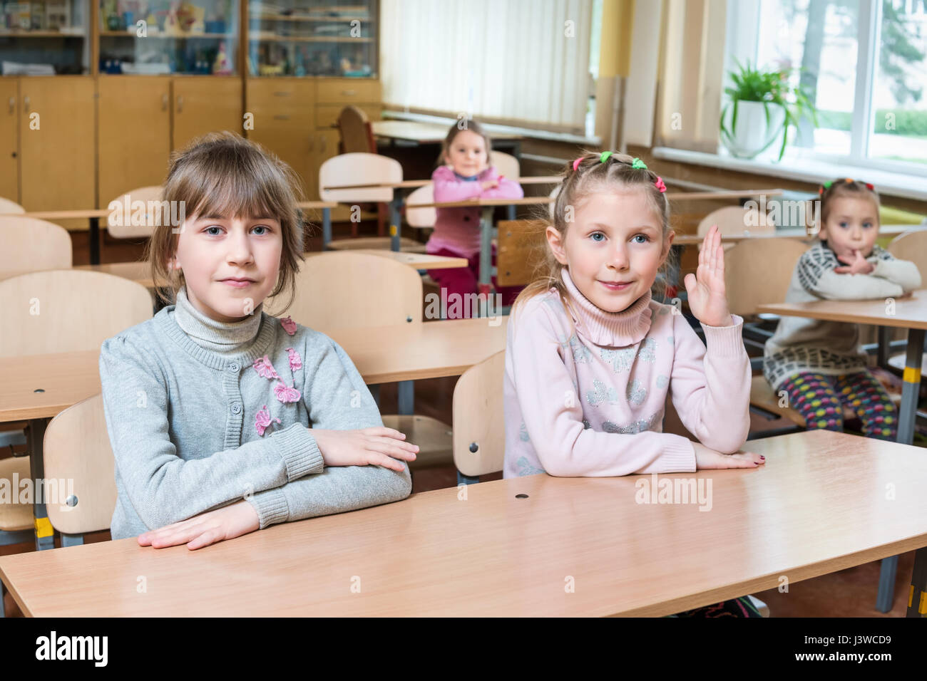 Children sit chair classroom hi-res stock photography and images - Alamy