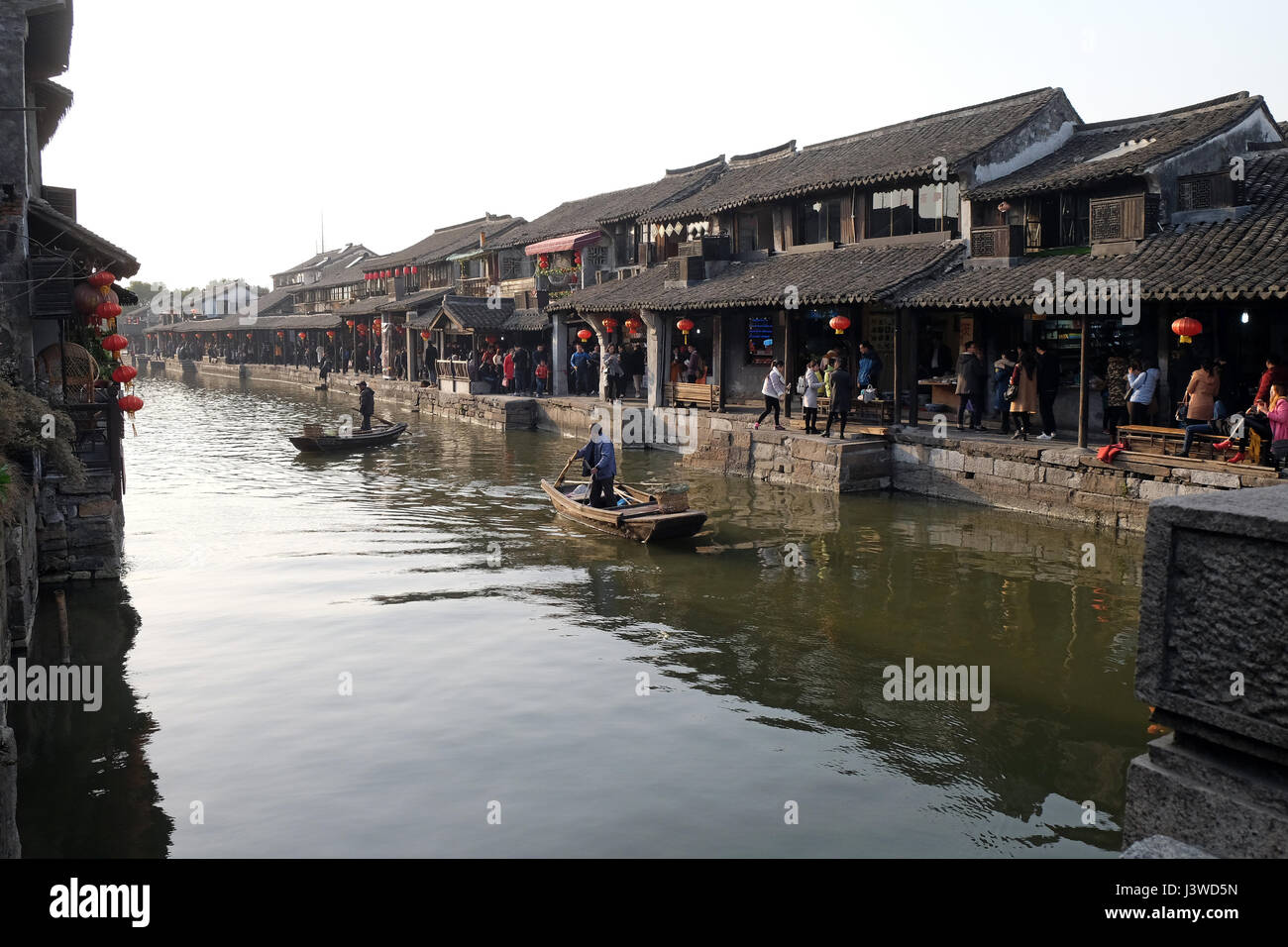 The Chinese architecture and buildings lining the water canals to ...