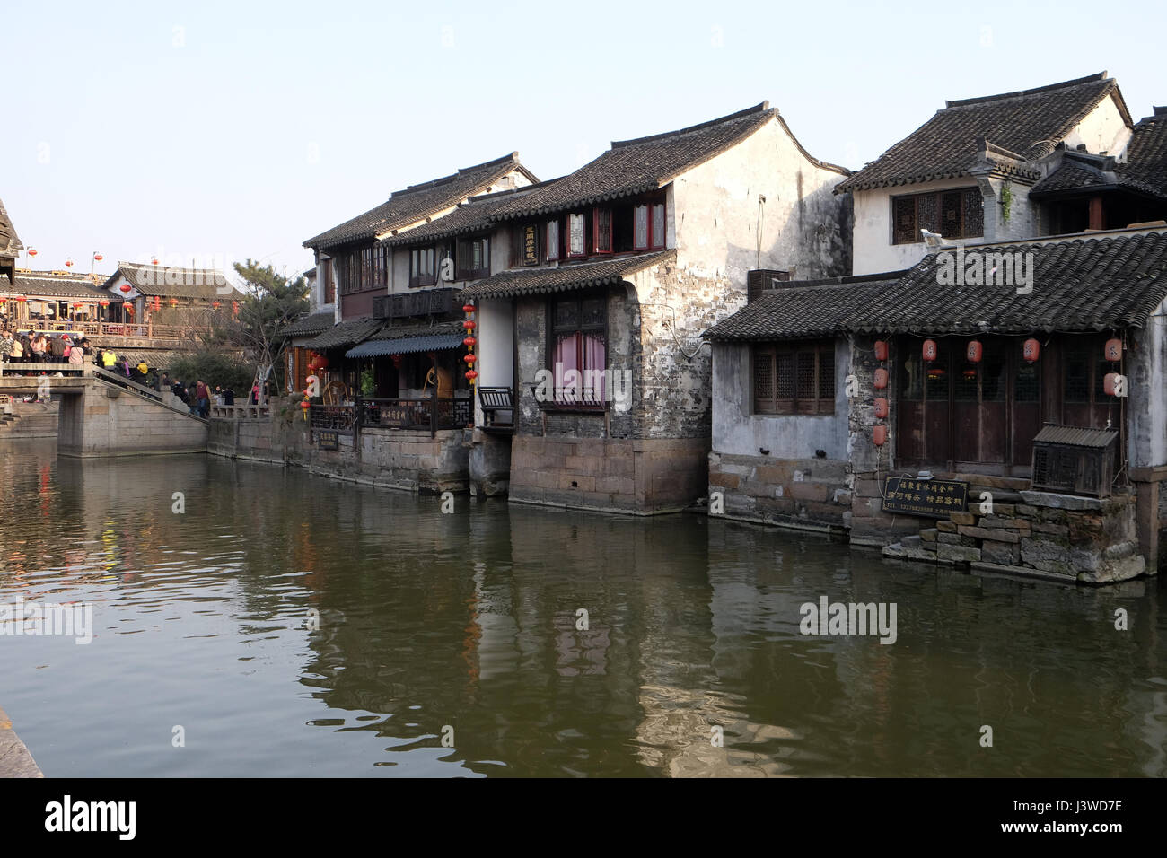 The Chinese architecture and buildings lining the water canals to ...