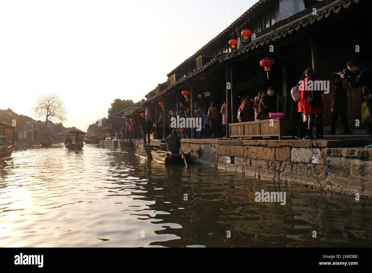 The Chinese architecture and buildings lining the water canals to ...
