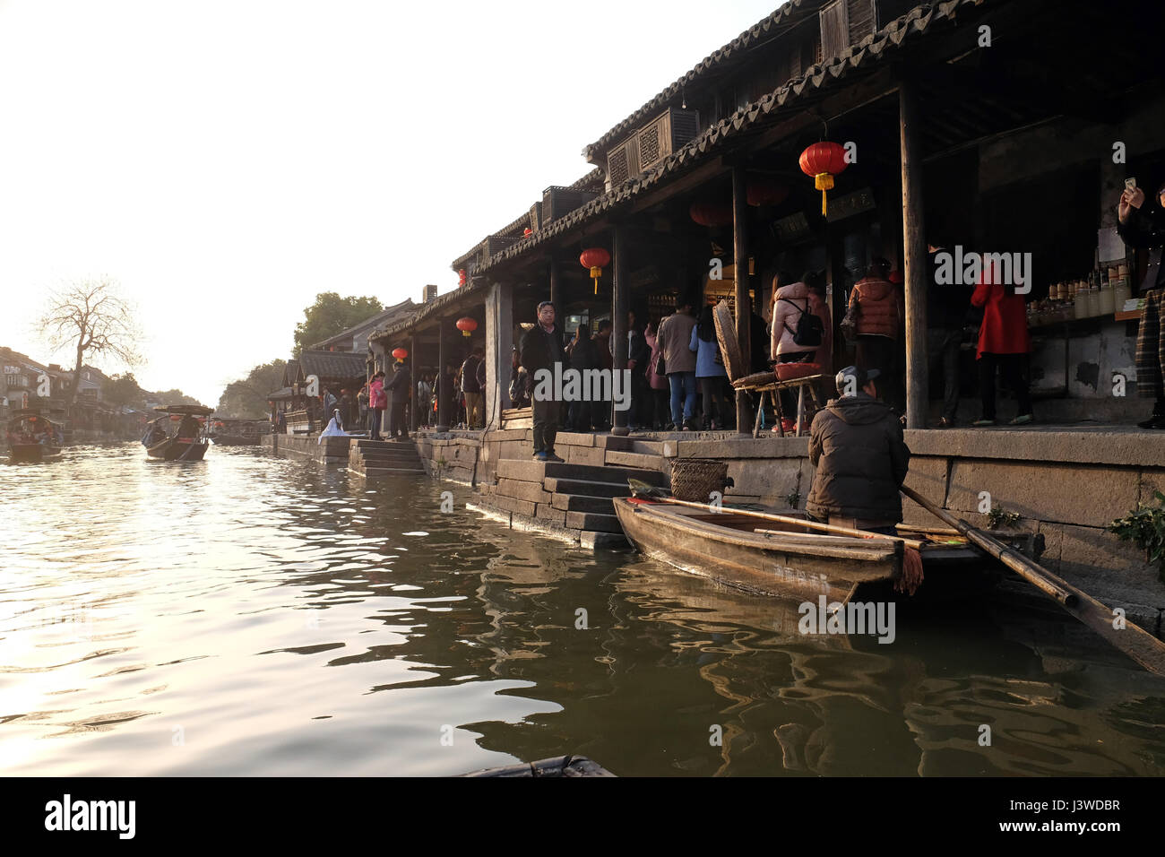 The Chinese architecture and buildings lining the water canals to ...