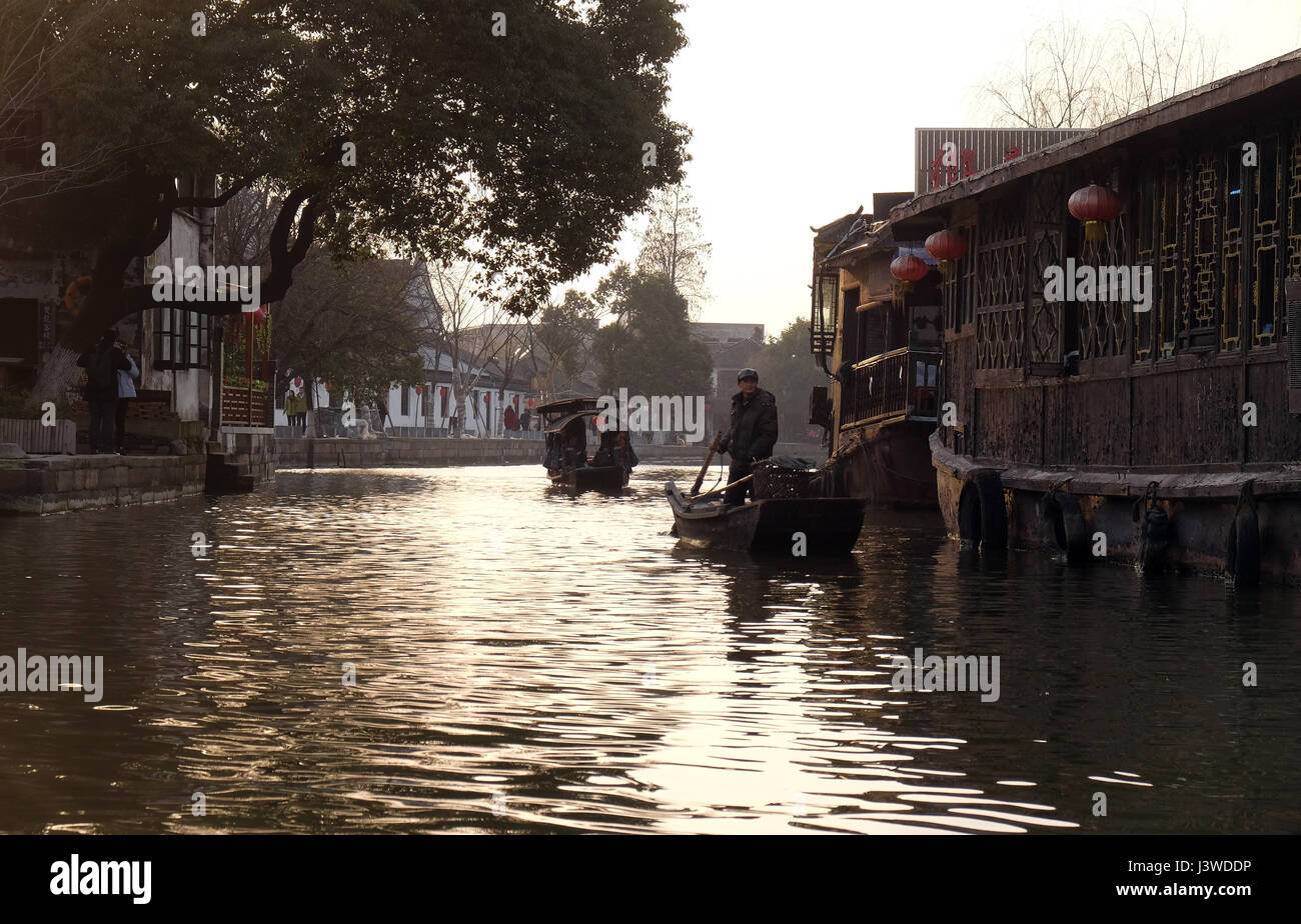 The Chinese architecture and buildings lining the water canals to ...