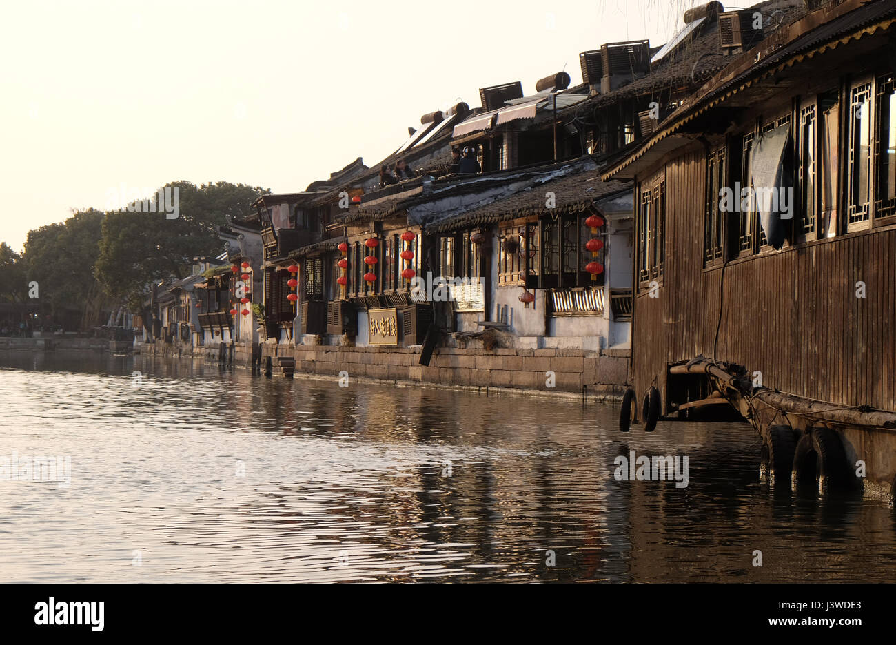 The Chinese architecture and buildings lining the water canals to ...