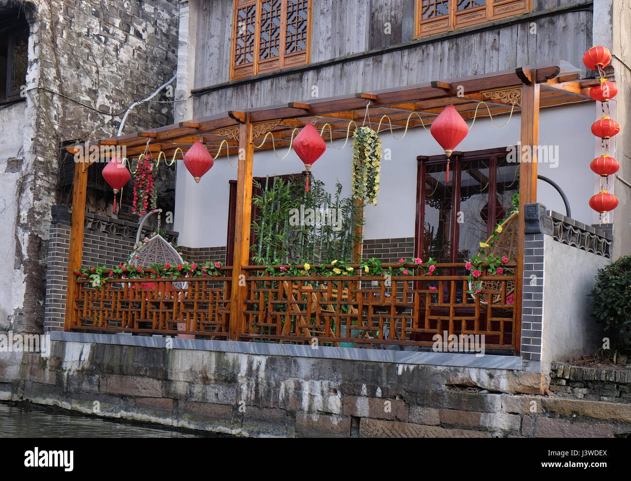 The Chinese architecture and buildings lining the water canals to ...