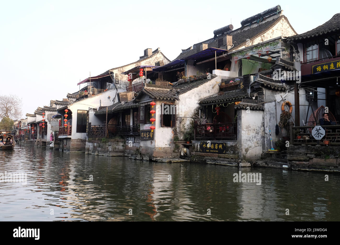 The Chinese architecture and buildings lining the water canals to ...
