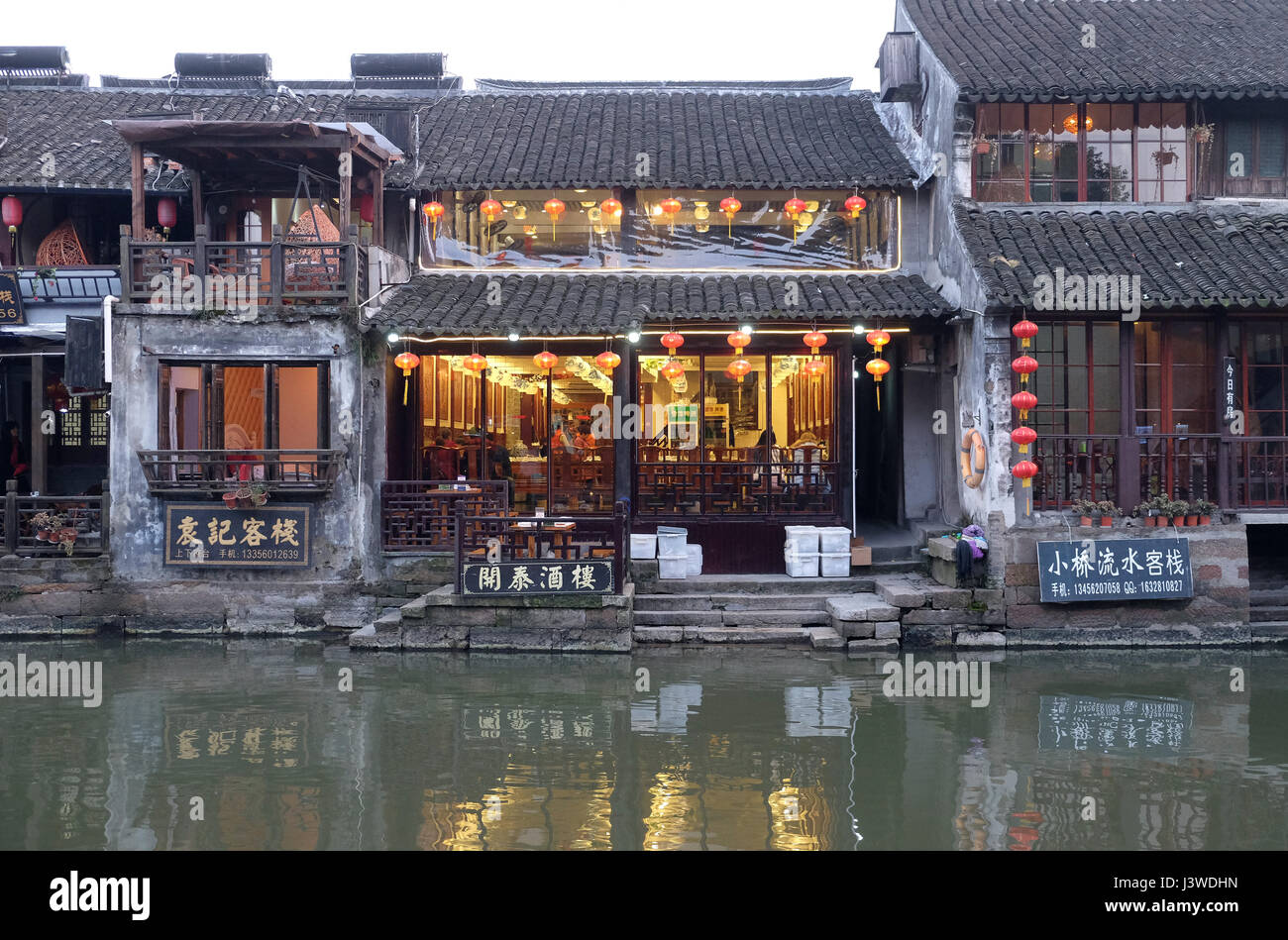 The Chinese architecture and buildings lining the water canals to ...