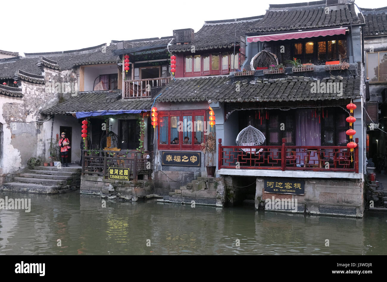 The Chinese architecture and buildings lining the water canals to ...