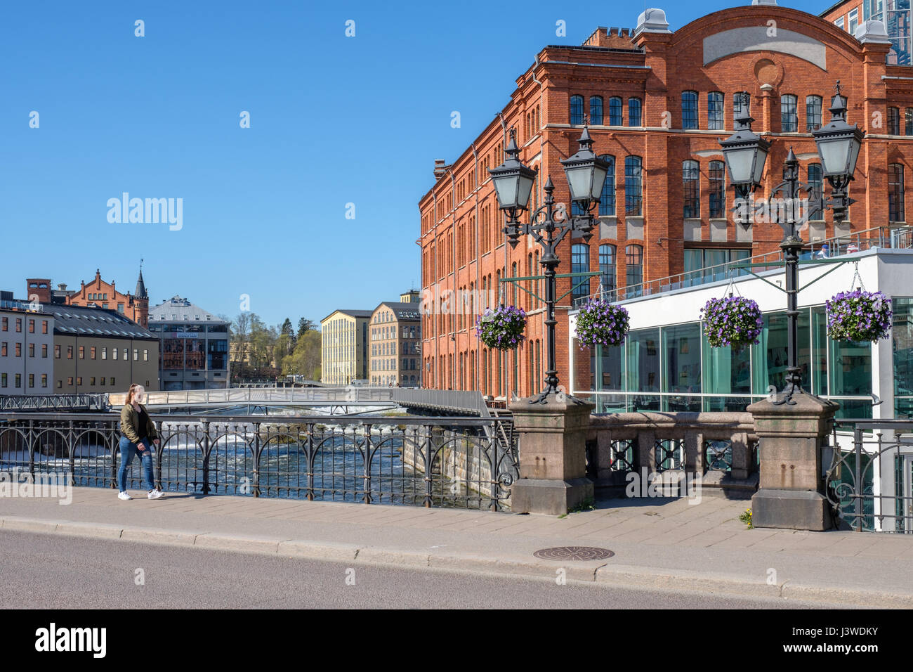 Motala river and the industrial landscape in Norrkoping. Norrkoping is ...