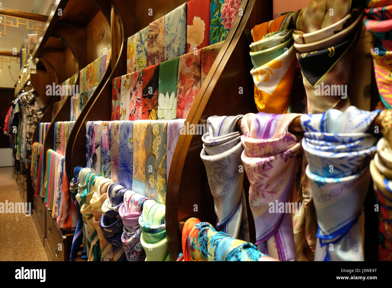 Silk scarves for sale at silk shop in Hangzhou city, China, February 21 ...