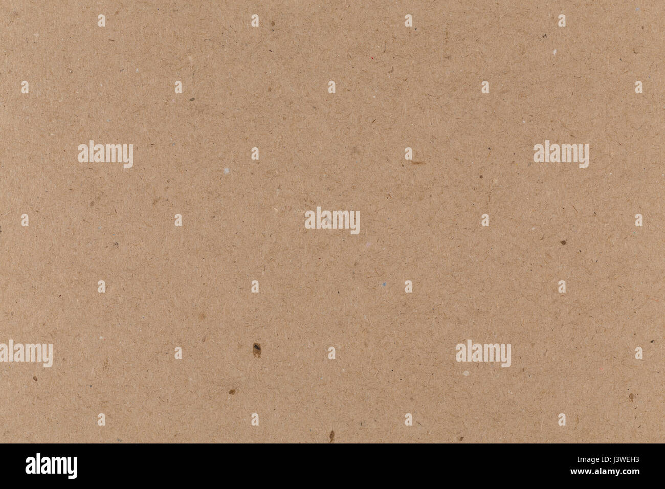 Dense cardboard paper closeup texture or background Stock Photo - Alamy