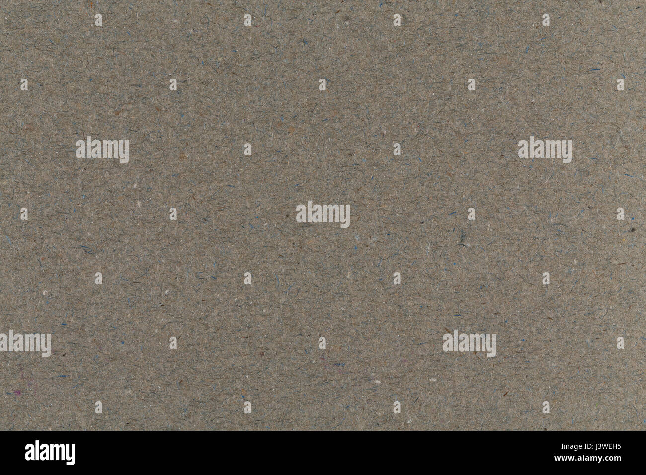 Dense cardboard paper closeup texture or background Stock Photo - Alamy