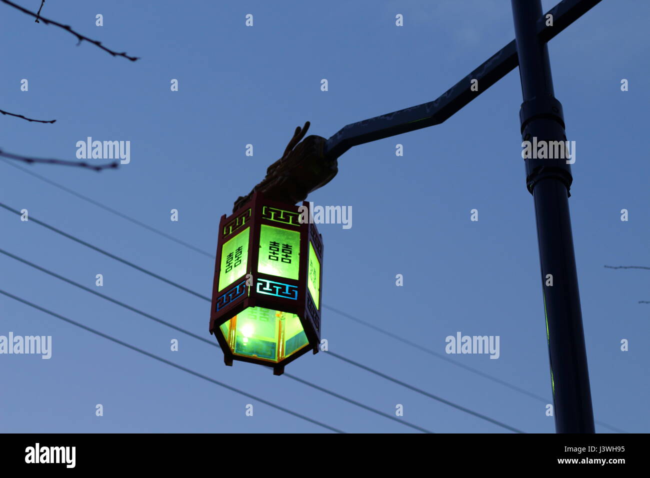 Green lamp post Stock Photo - Alamy
