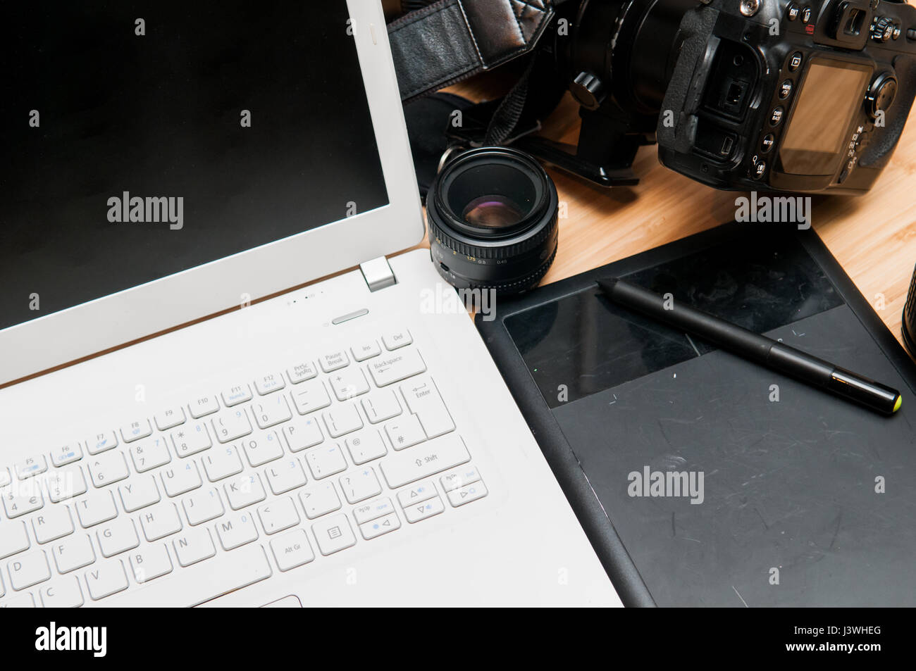 Professional photography editing equipment with camera and laptop Stock ...