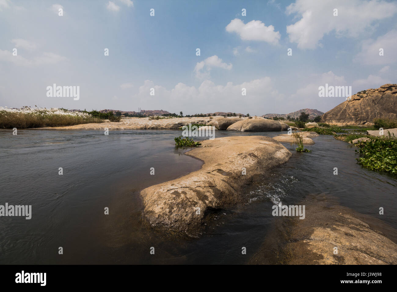 Tungabhadra River on a sunny day, Hampi, Karnataka, India Stock Photo ...